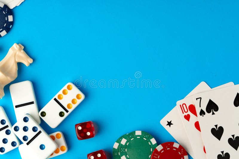 Playing Cards, Chips and Dice on Blue Backgorund Top View Stock Photo ...
