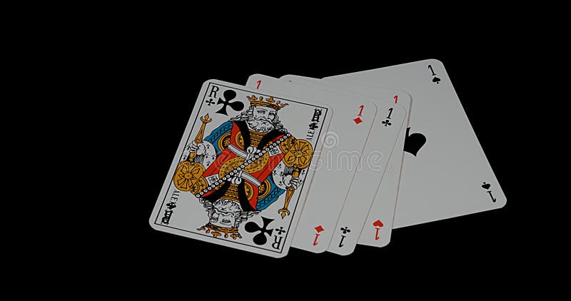 Playing Cards, Four Aces and One King Falling Againt Black Background ...