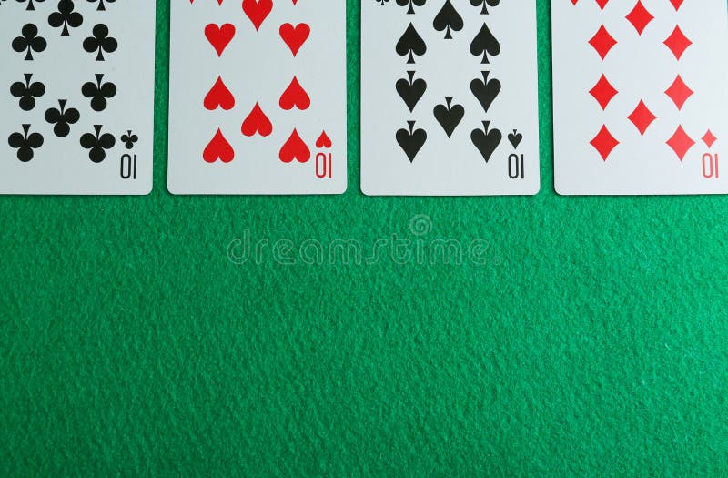 Playing Cards with Four of Kind Combination on Green Table, Flat Lay ...
