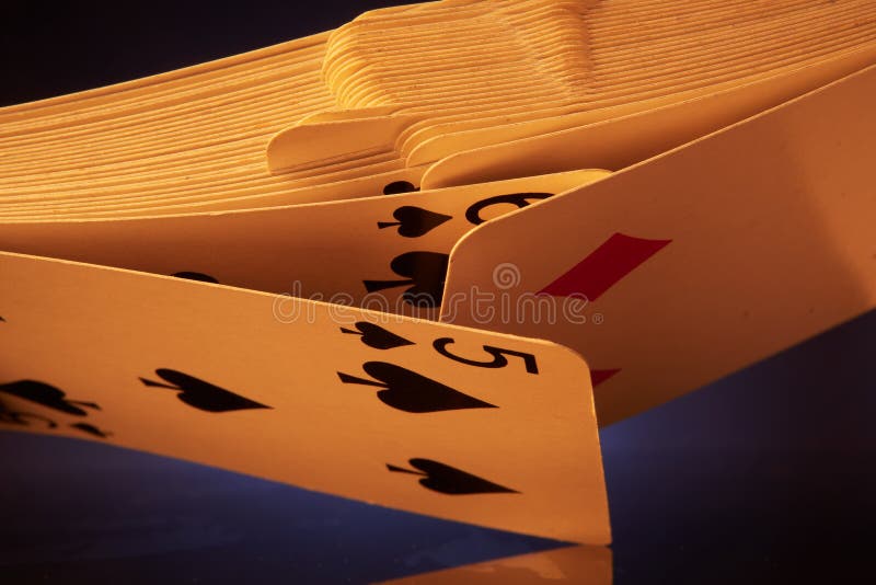 Playing Cards in a Near Perfect Shuffle Stock Photo - Image of shuffle ...