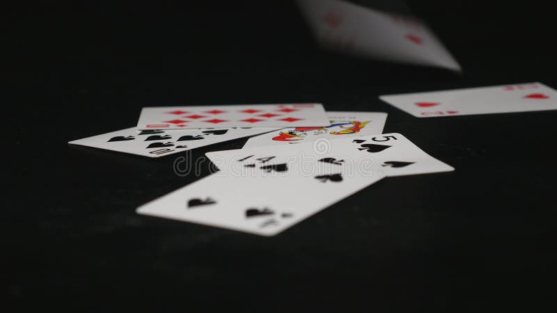 Playing Cards. Playing Cards Falling on Black Table Stock Image - Image ...