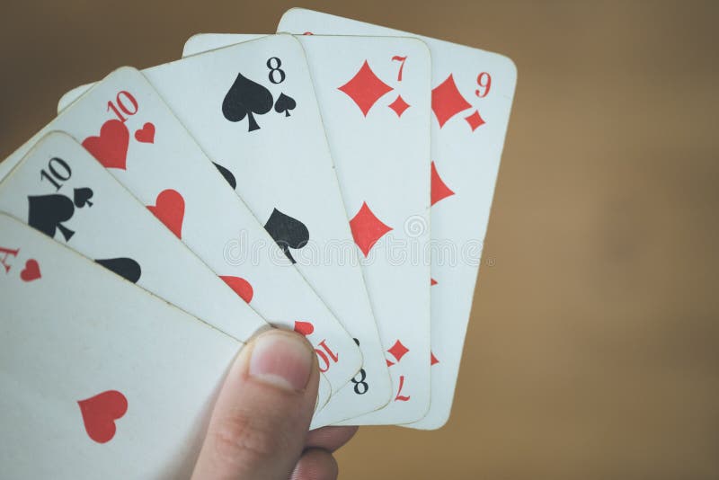 Playing Cards: Poker Cards in the Hand of a Man Stock Photo - Image of ...