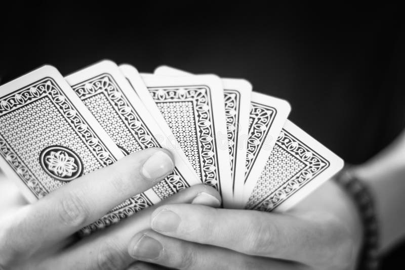 Playing Cards: Poker Cards in the Hand of a Young Man Stock Photo ...