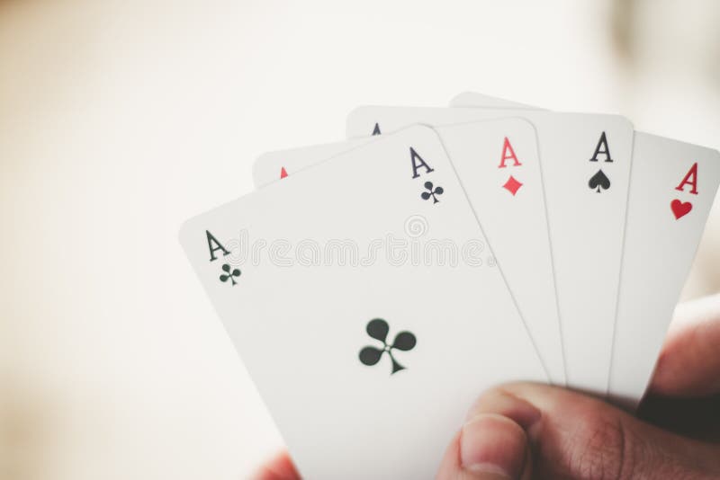 Playing Cards: Poker Cards in the Hand of a Young Man Stock Image ...