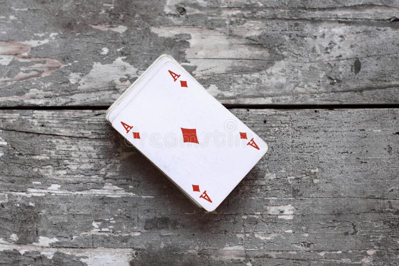 Playing Cards on a Rustic Wooden Table. Stock Photo - Image of game ...