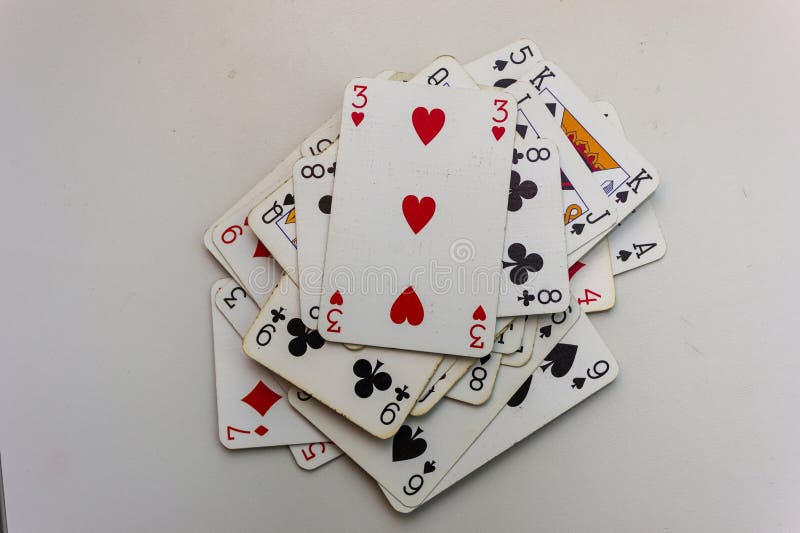 Playing cards on a table stock photo. Image of games - 328171696