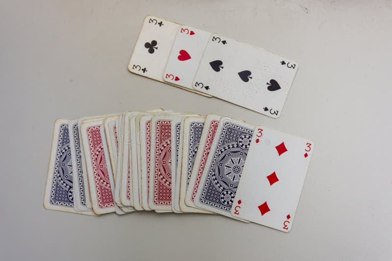 Playing cards on a table stock image. Image of playing - 328171675