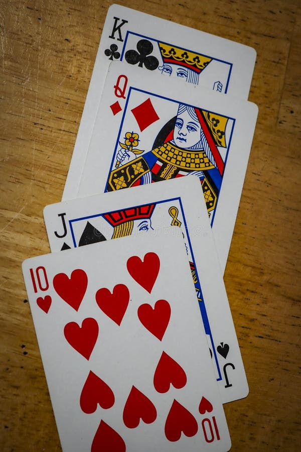 Playing cards on a table stock image. Image of table - 194501045
