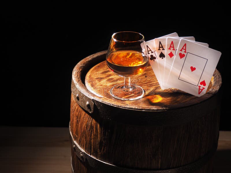Playing Cards and Wine Glass of Cognac on Barrel Stock Image - Image of ...