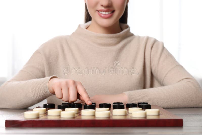 Playing Checkers Woman Thinking Next Move Table Room Stock Photos ...