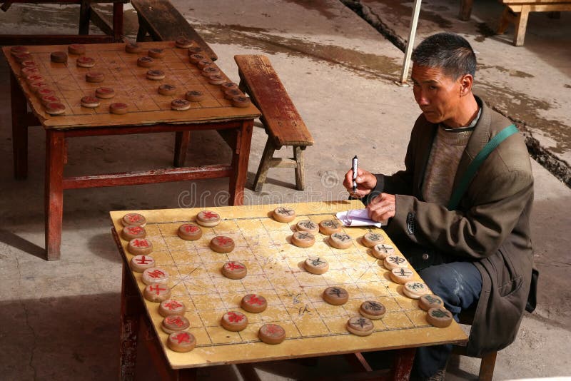 Playing chinese chess editorial photography. Image of asia - 28274227