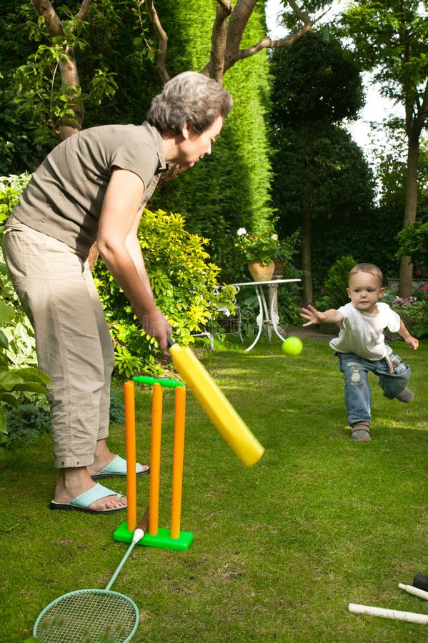Playing cricket. stock photo. Image of action, outdoors - 22419510