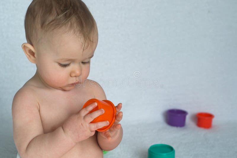 Playing with Cups stock photo. Image of pure, baby, innocent - 2450162