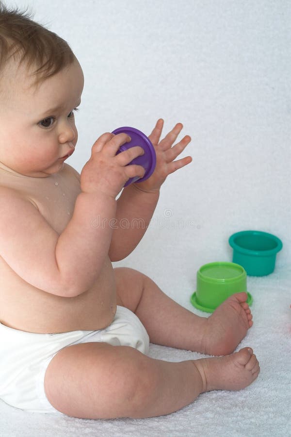 Playing with Cups stock image. Image of rosy, small, infant - 2407607