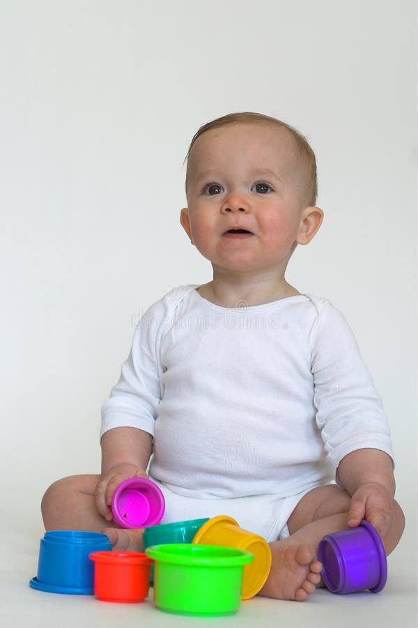 Playing with Cups stock image. Image of playful, bare - 2450147