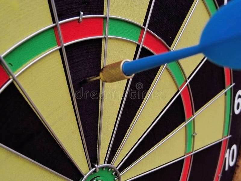 Playing darts with darts stock photo. Image of target - 378209432