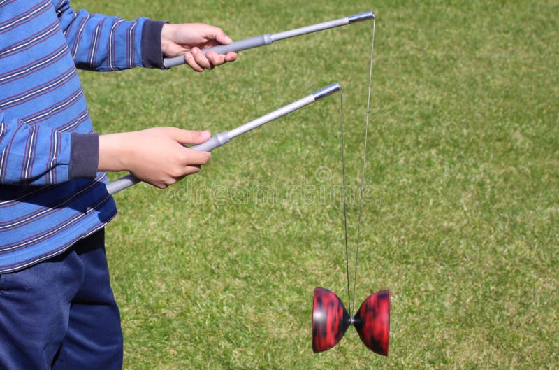 Playing diabolo stock photo. Image of enjoyment, skill - 9190852