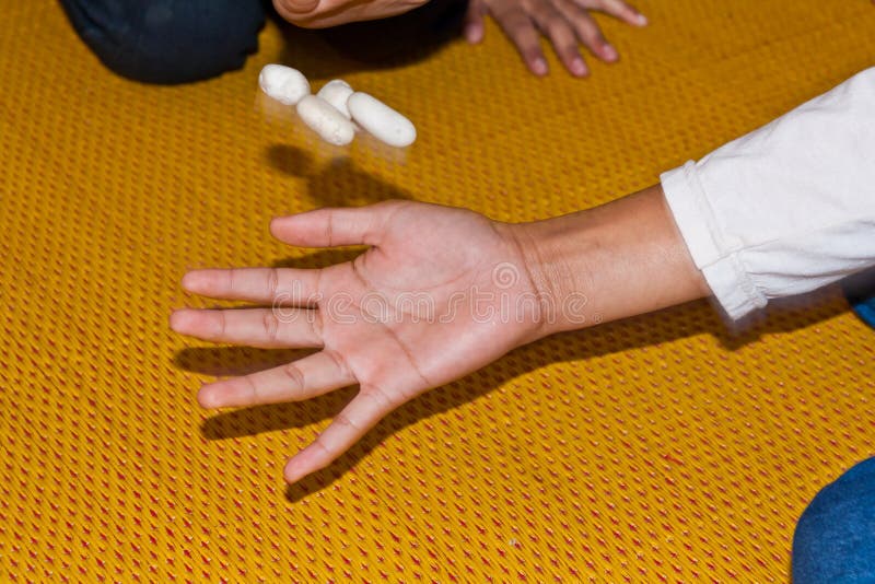Playing Dibs stock photo. Image of granite, hand, kneel - 25599688