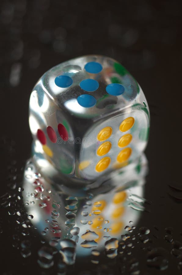 Playing Dice in Transparent Resin and Multicolored Numbers Stock Photo ...
