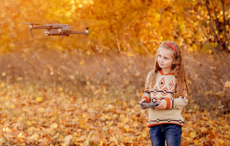 Playing with Drone in Autumn Park Stock Image - Image of outdoor, gold ...
