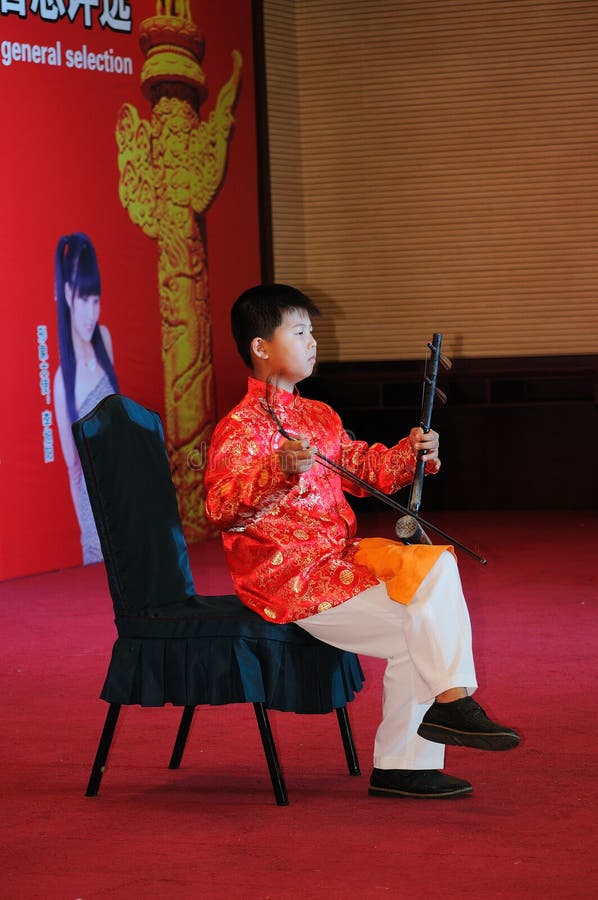 Playing the erhu boy editorial photography. Image of festival - 25609017