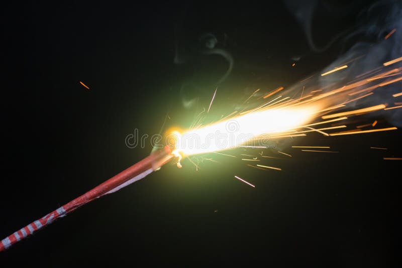 Playing of Fireworks at Night Stock Photo - Image of adult, christmas ...
