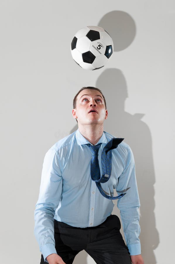 Playing football at office stock image. Image of leisure - 21373327