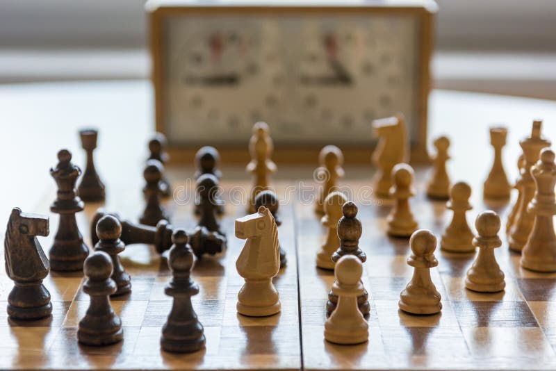 Playing a Game of Chess with Wooden Figures. Stock Photo - Image of ...