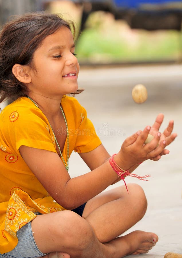 Playing girl stock photo. Image of indian, blur, poor - 11193388