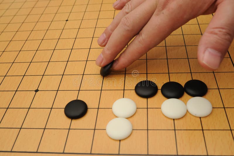 Playing go game stock image. Image of competitive, east - 9088417