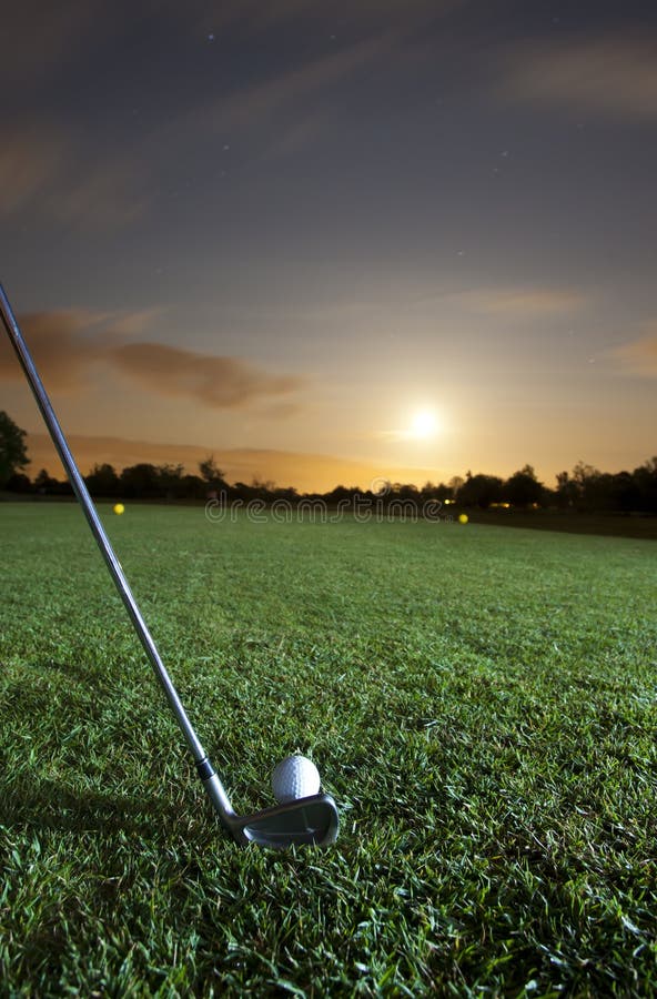 Playing golf at night stock image. Image of golf, competition - 25081689