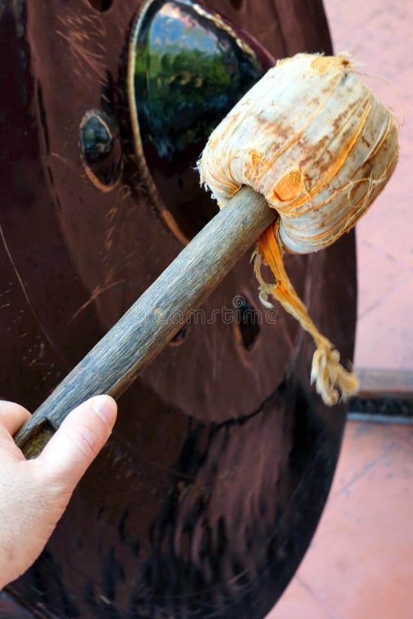 Playing the Gong stock photo. Image of music, performance - 38740712
