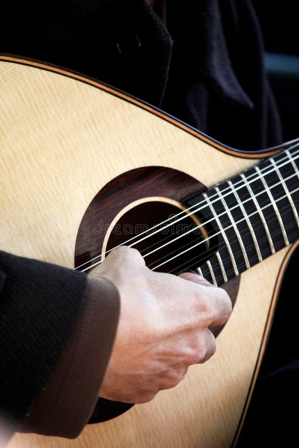 Playing the guitar stock photo. Image of hold, guitarist - 12284412