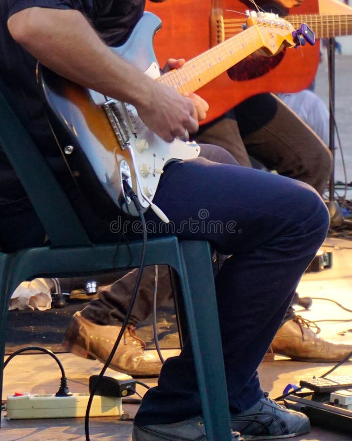 Playing guitar stock photo. Image of guitar, roll, artist - 60025330
