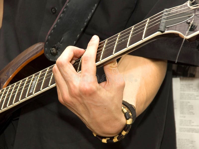 Playing guitar closeup stock image. Image of musical - 86264245