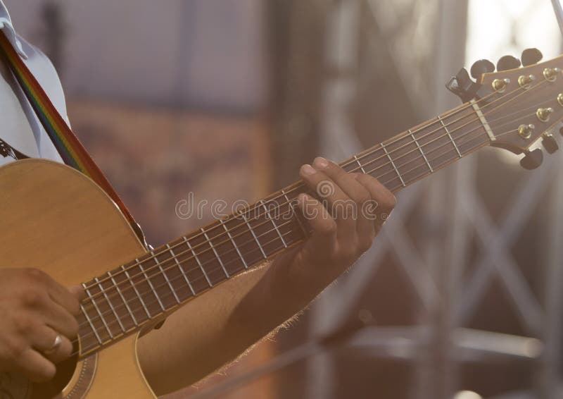 Playing guitar on stage stock image. Image of guitarist - 102260757