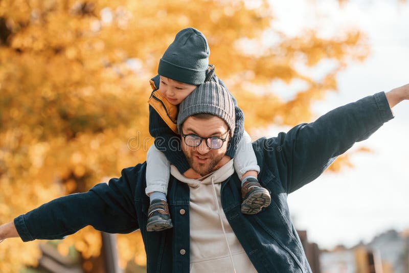 Playing and Having Fun. Father and Son is Indoors at Home Together ...