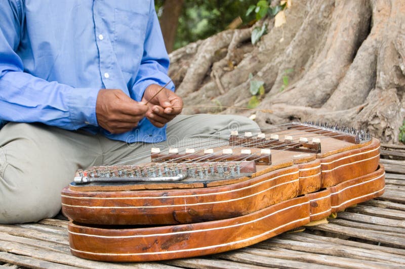 Playing a Khim Musical Instrument, Cambodia Stock Photo - Image of wood ...