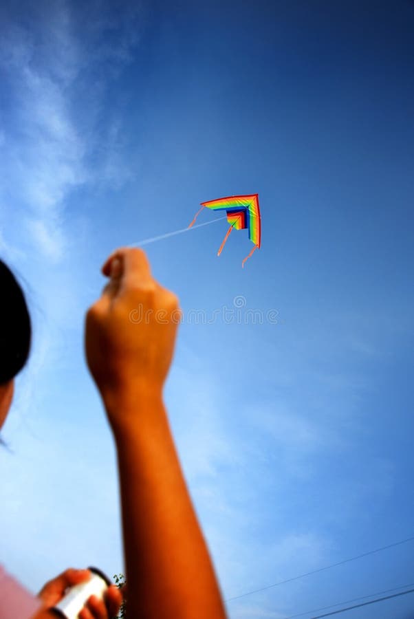 Hand holding a Kite stock photo. Image of color, surfing - 2134036