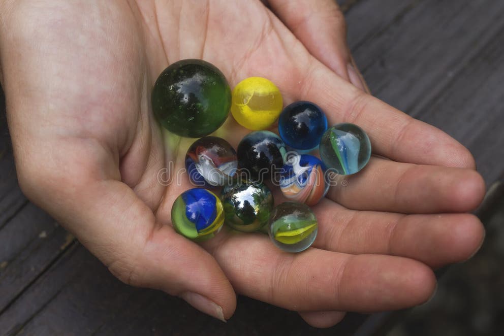 Playing marbles stock image. Image of table, nostalgia - 86688455