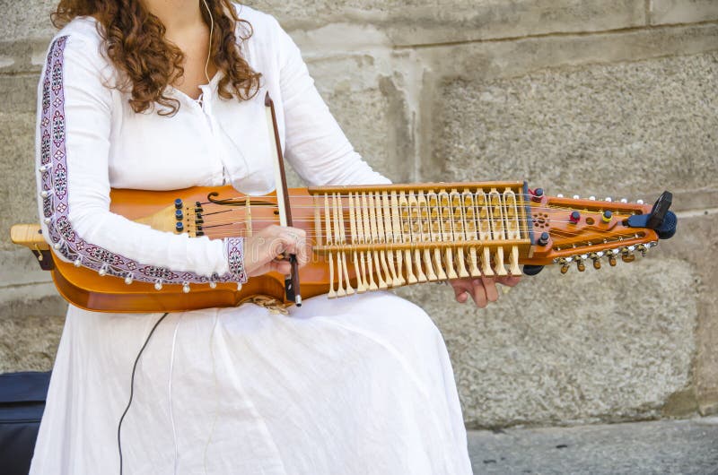 Playing a Medieval Instrument Stock Photo - Image of show, lifestyle ...
