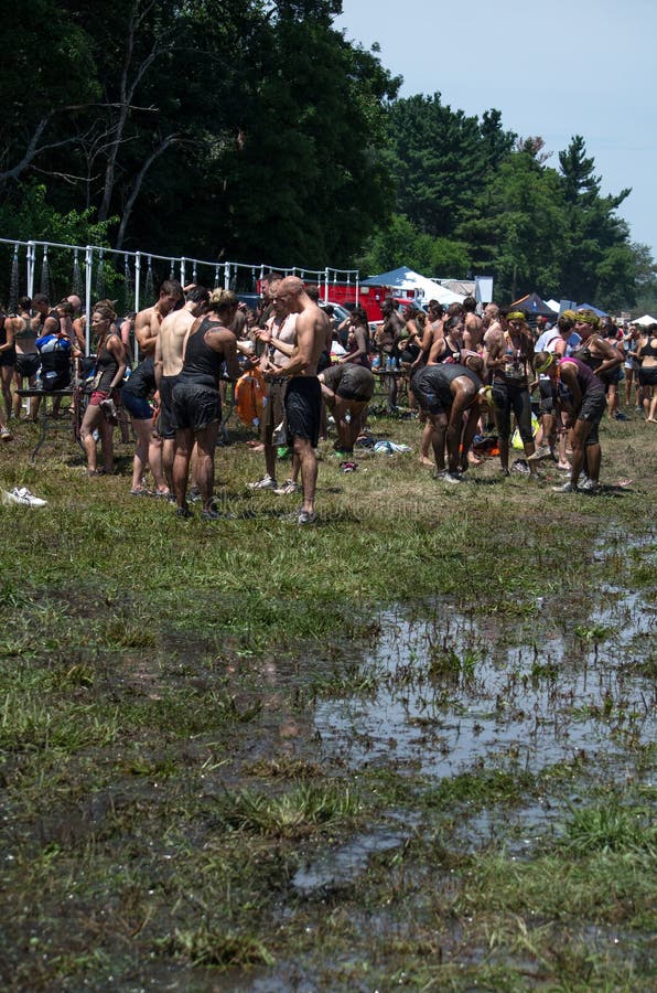 Playing in the mud editorial image. Image of challenging - 25854460