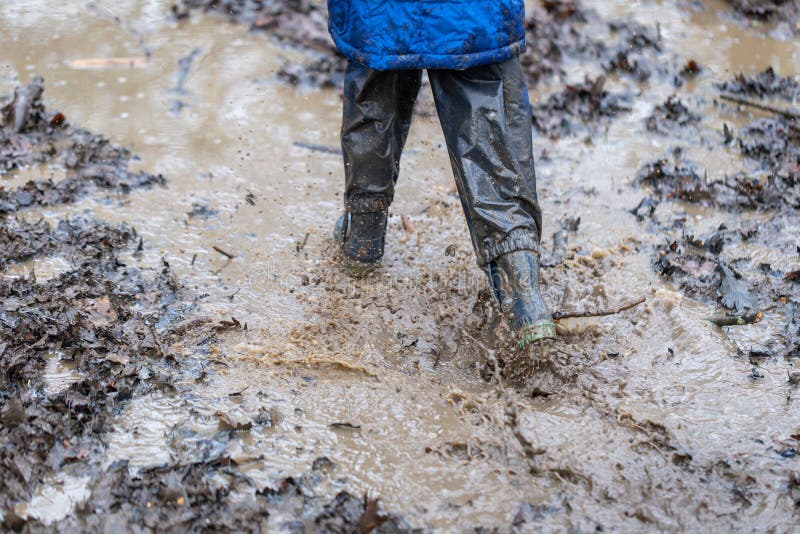 Playing in Mud stock image. Image of oute, leisure, action - 135378887