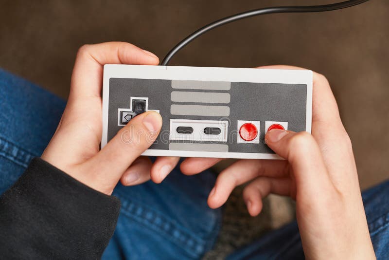 Playing an Old Gaming Console Stock Photo - Image of console, closeup ...