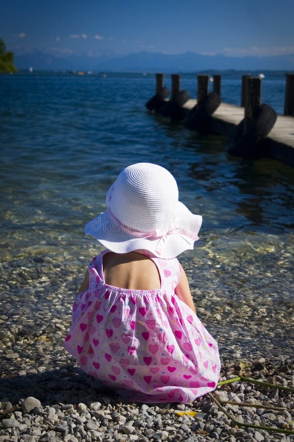 Playing with pebbles stock photo. Image of caribbean - 16133010