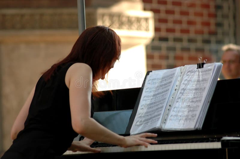 Playing piano stock photo. Image of melody, concert, bond - 3442152