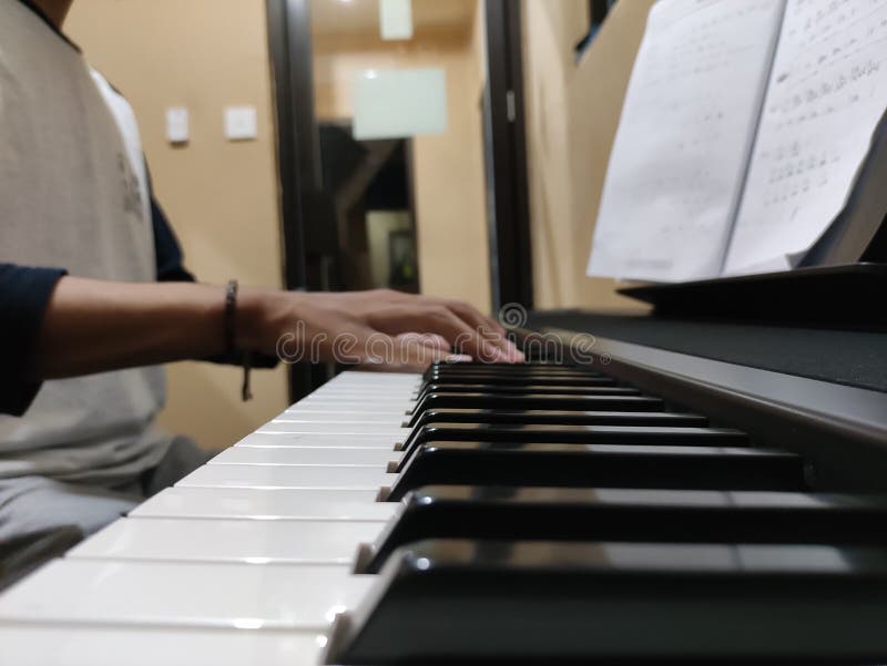Playing piano tiles stock photo. Image of piano, tiles - 229007226