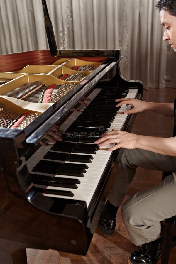 Piano duet stock image. Image of artist, male, female - 30626079