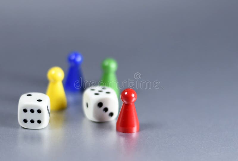 Playing pieces and dice stock image. Image of friendship - 68981831