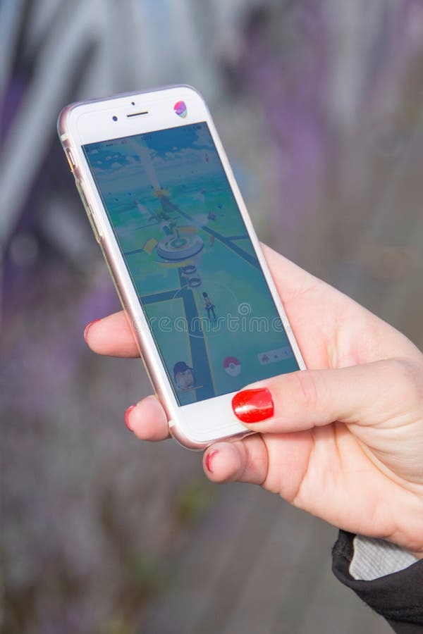 Playing Pokemon Go editorial photo. Image of incubated - 78166936